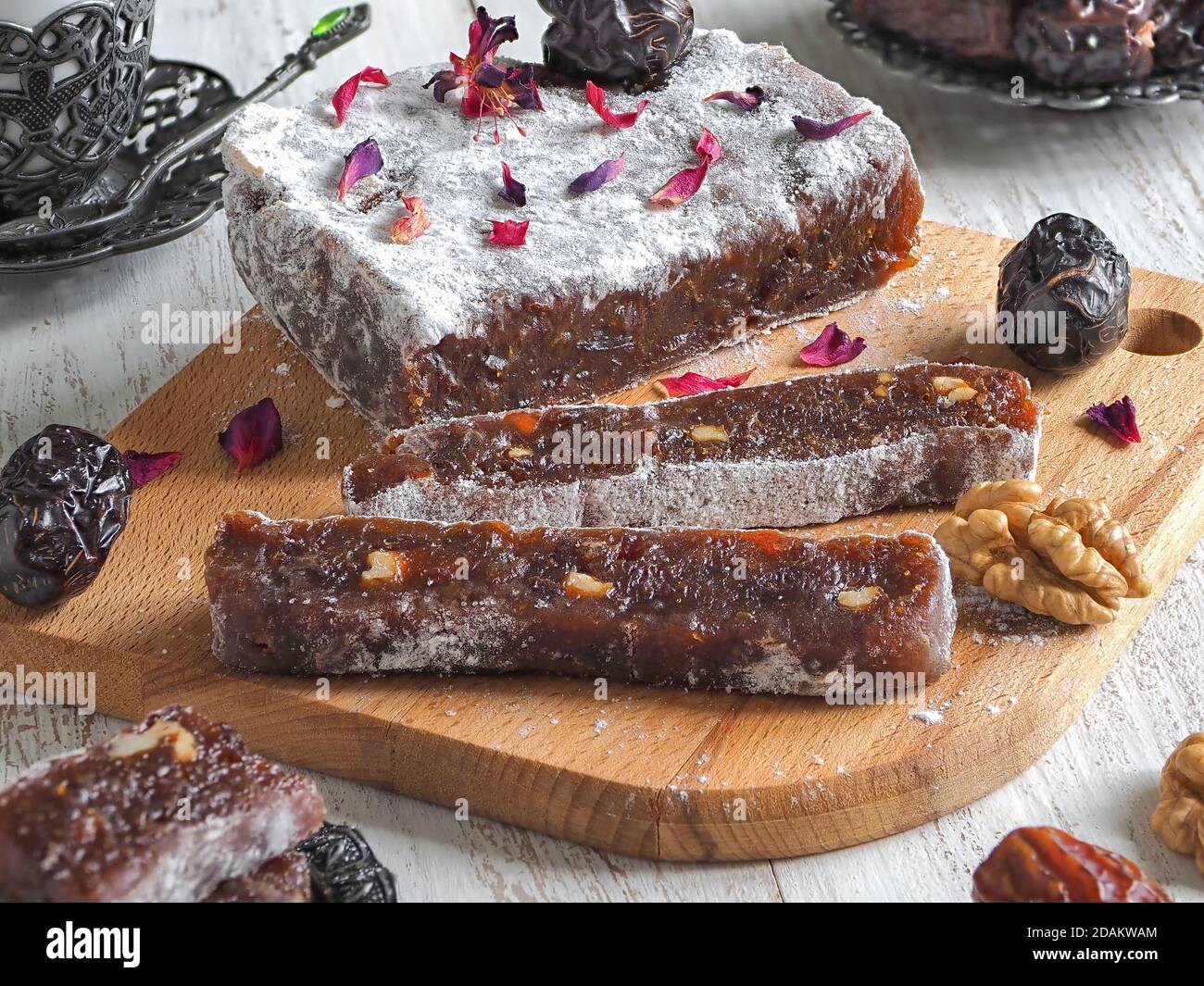 Homemade marmalade sweets with date fruits and nuts, eastern candies on ...