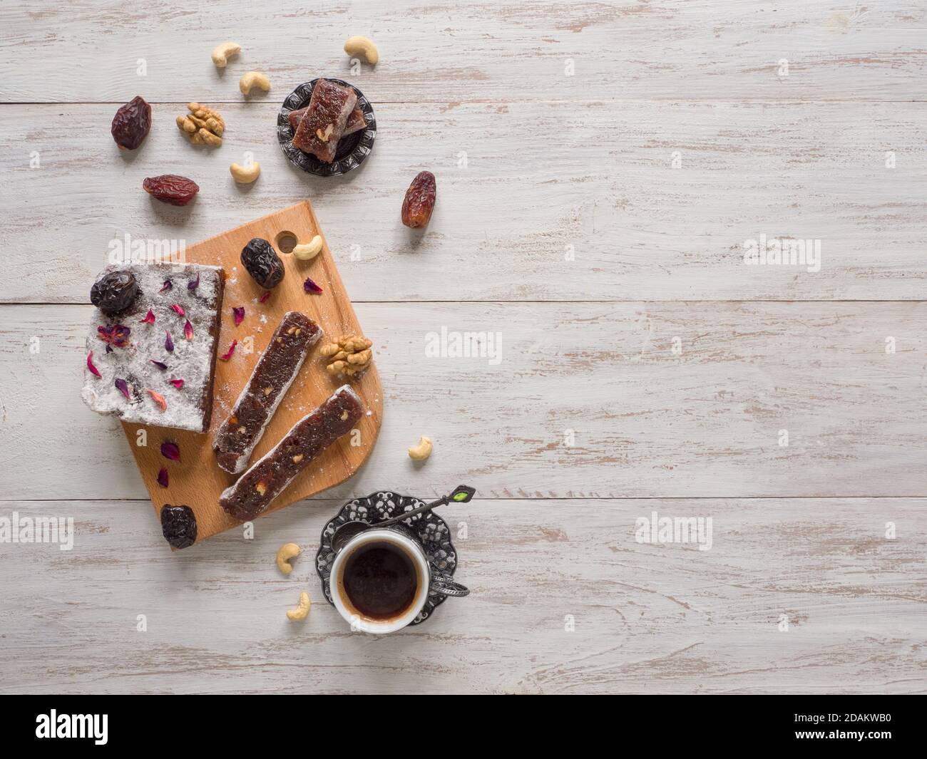 Homemade marmalade sweets with date fruits and nuts, eastern candies on ...