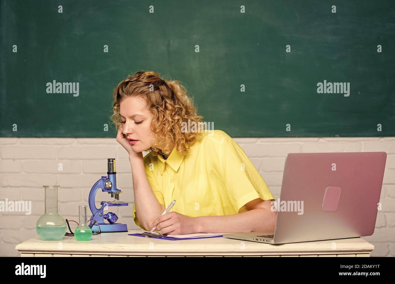 Wisdom. scientist at school lab. biology experiment research. make ...
