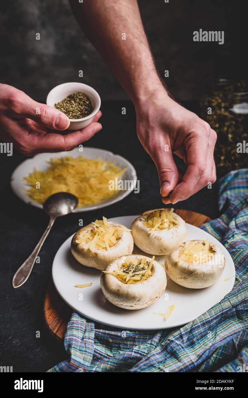 Hand cutting cheese stuffed hi-res stock photography and images - Alamy
