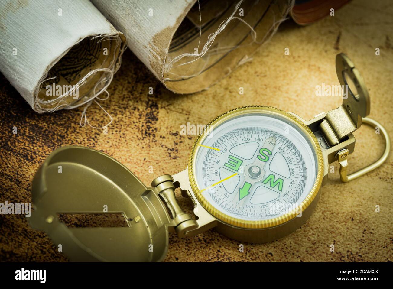 Old maps with a compass. The concept of expeditions and travel ...