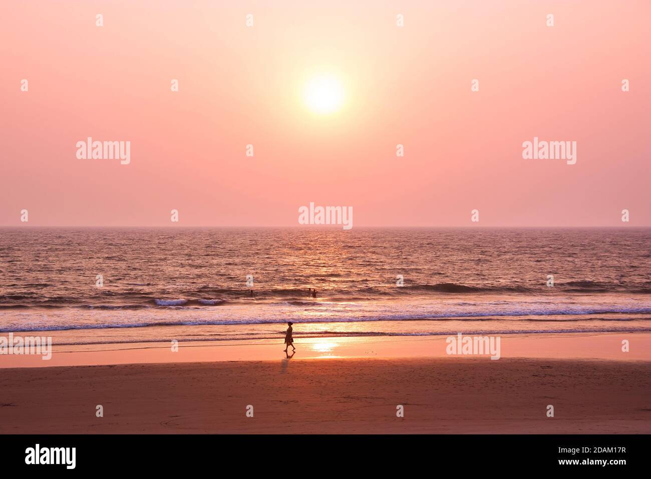 Colorful sunset on the beach. Goa, India Stock Photo - Alamy
