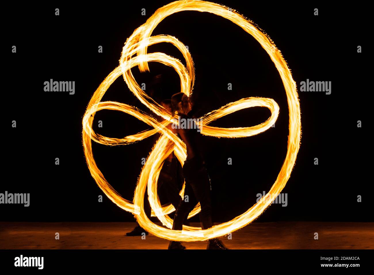 The power to manipulate heat and fire. Couple of dancers manipulate burning pois. Fire ...