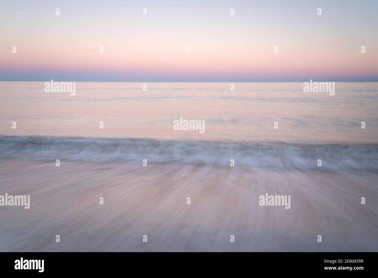 The Belt of Venus saturates a minimalist seacape with pastel tones ...