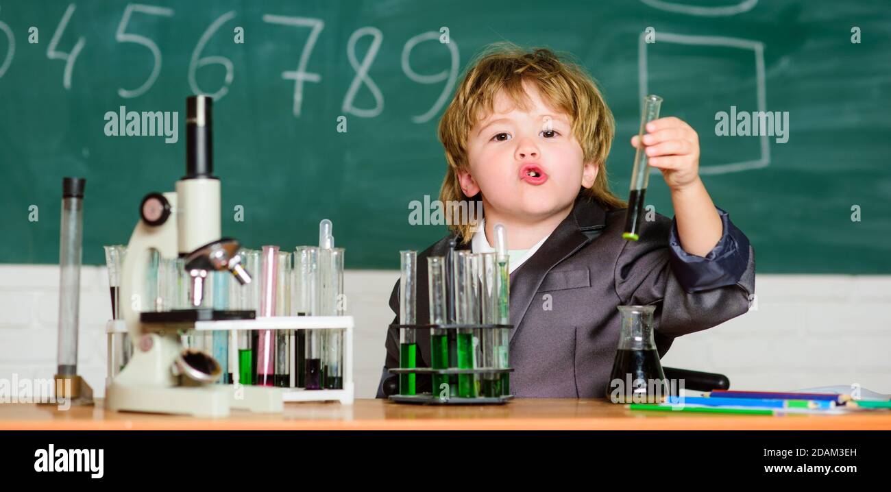 Biology school laboratory equipment. Little boy at the elementary ...