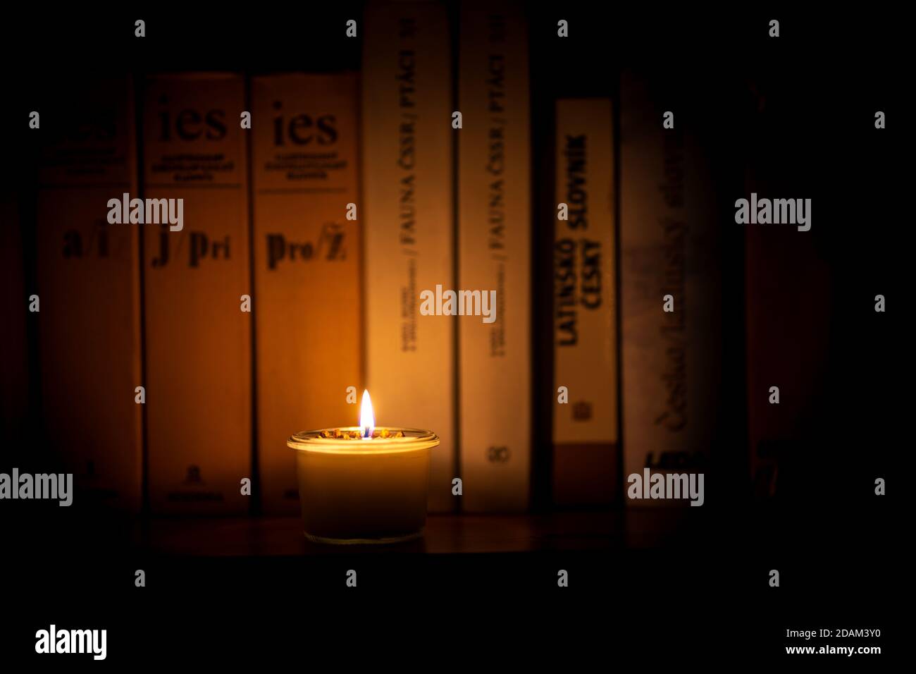 Candle book wallpaper hi-res stock photography and images - Alamy