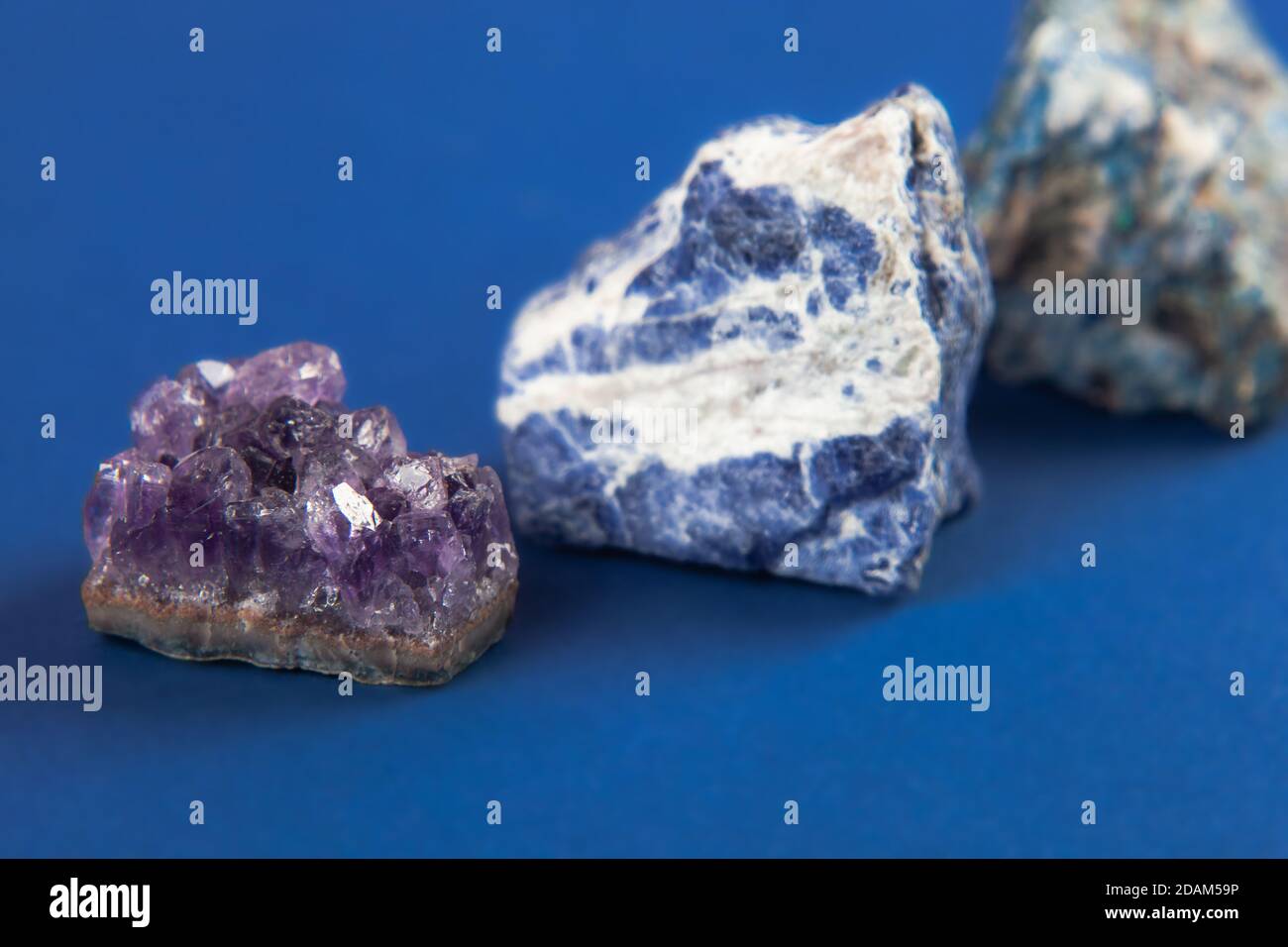 set of close up Natural minerals, precious stones on classic blue ...