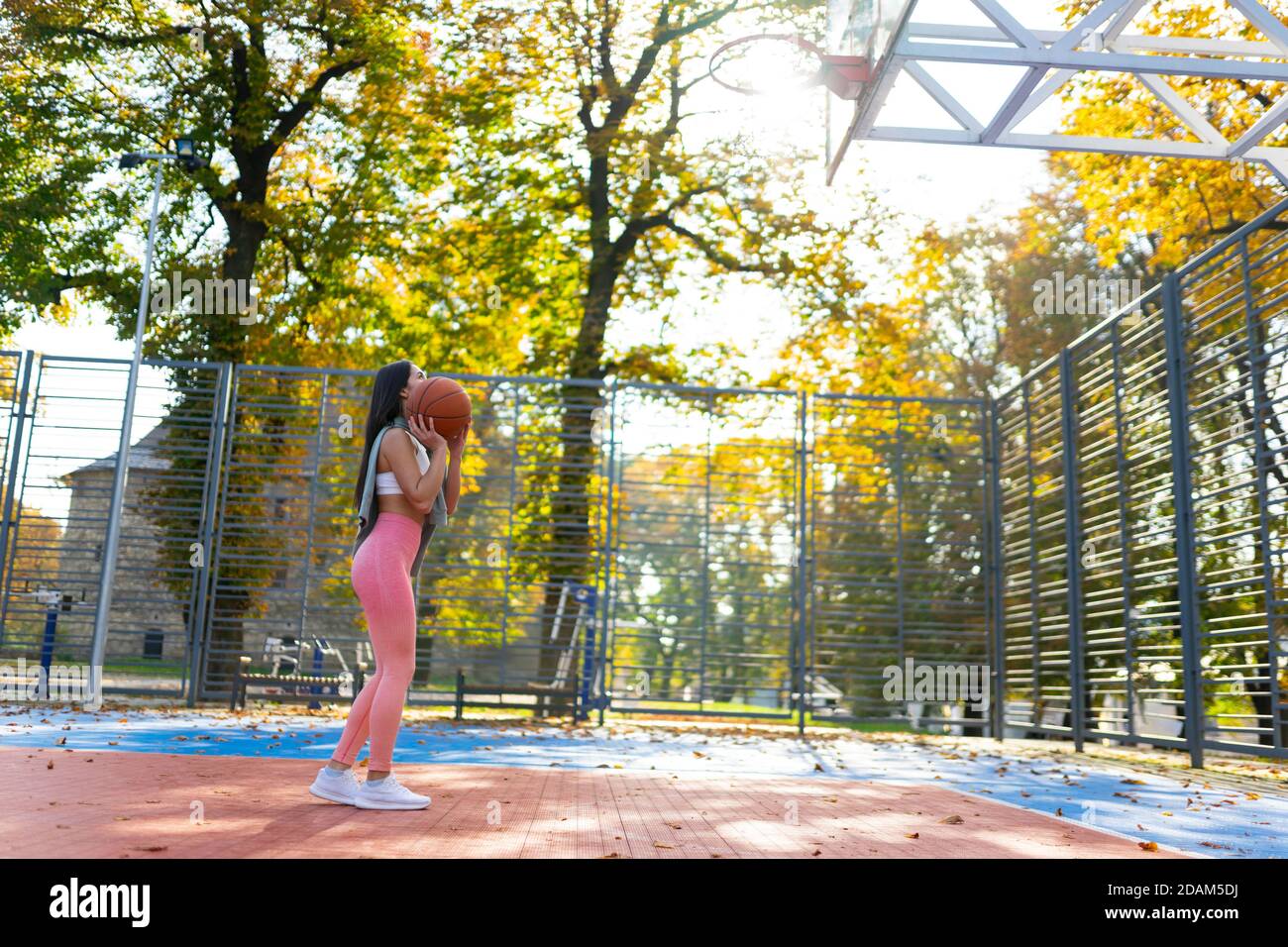 Female basketball player getting ready to make a ball throw to the ...
