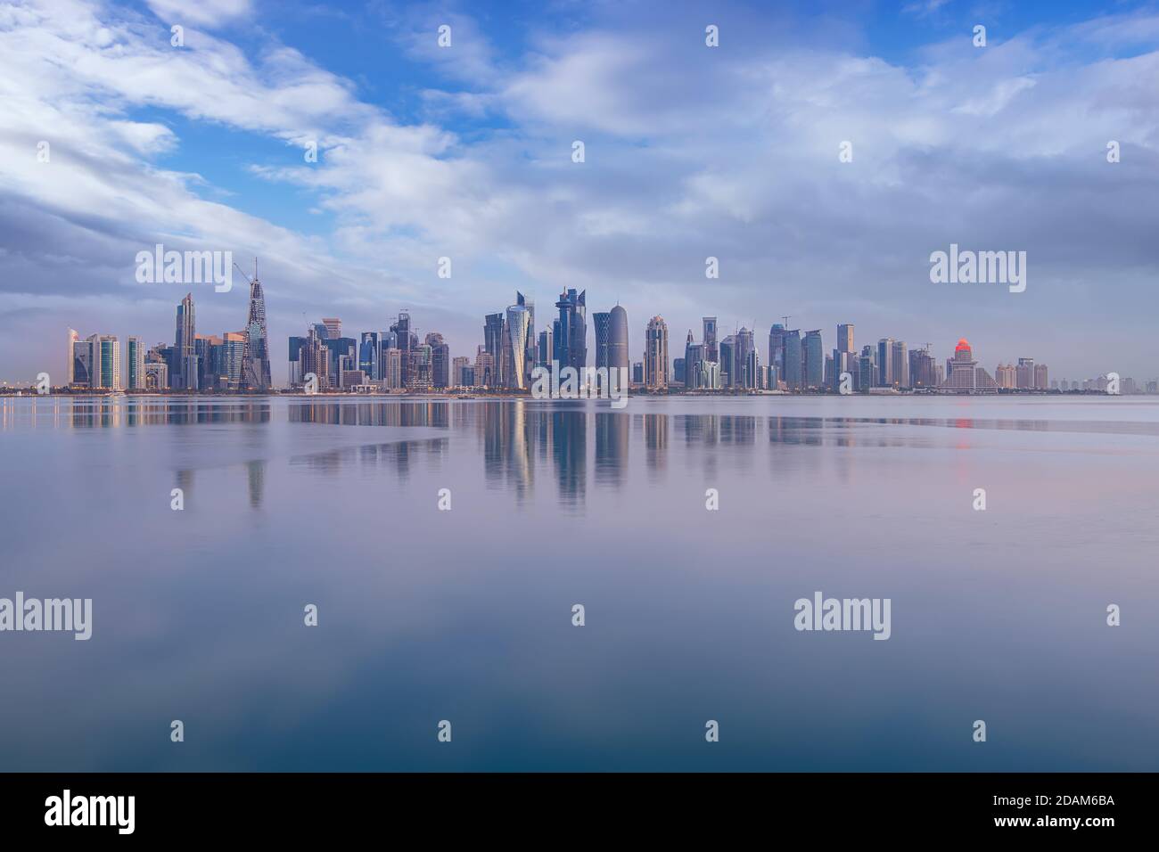 The skyline of Doha, Qatar during sunset Stock Photo - Alamy