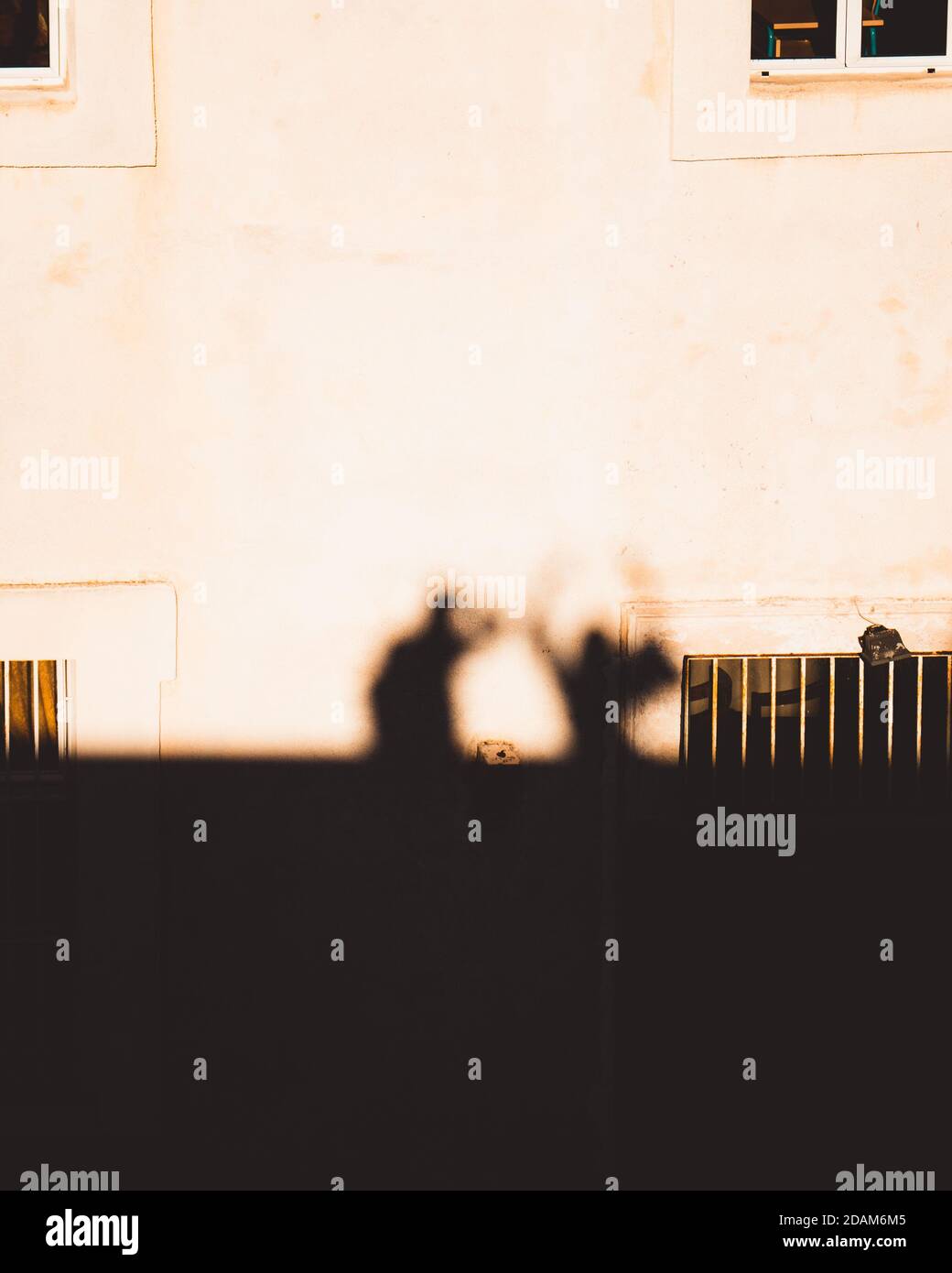 Shadows cast on exterior wall hi-res stock photography and images - Alamy