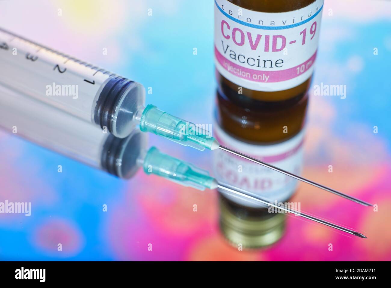 Covid-19 vaccine and syringe injection - stop pandemic Stock Photo - Alamy