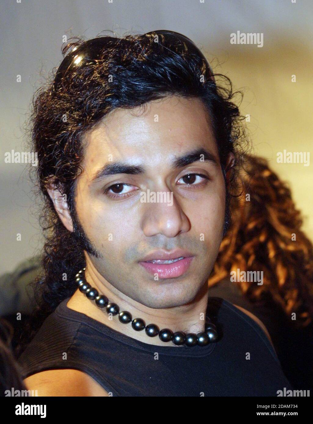 Miami Beach, FL 3-21-02Anand Jon preparing his models before his ...