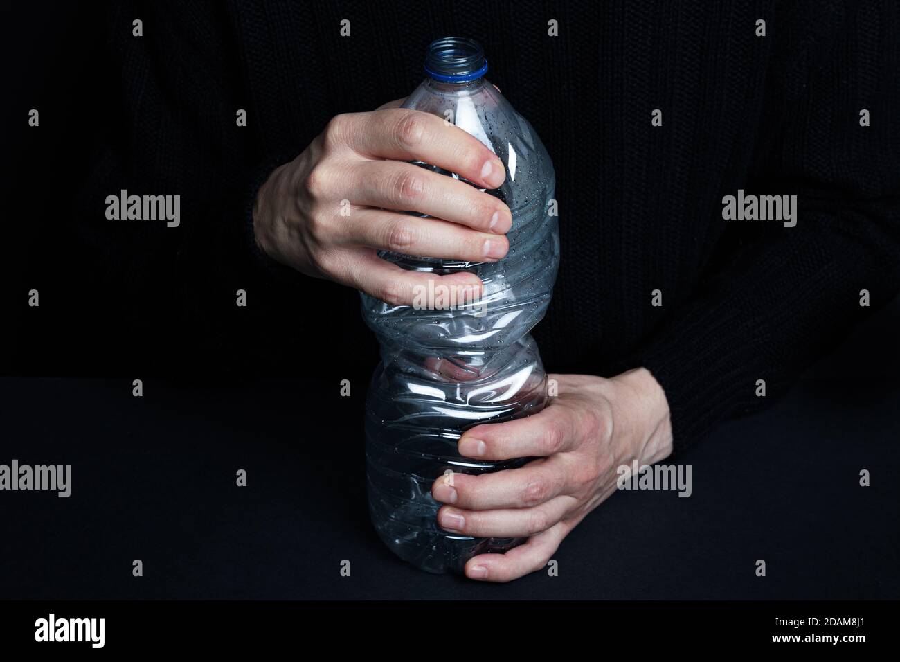 Black plastic bottle hi-res stock photography and images - Alamy