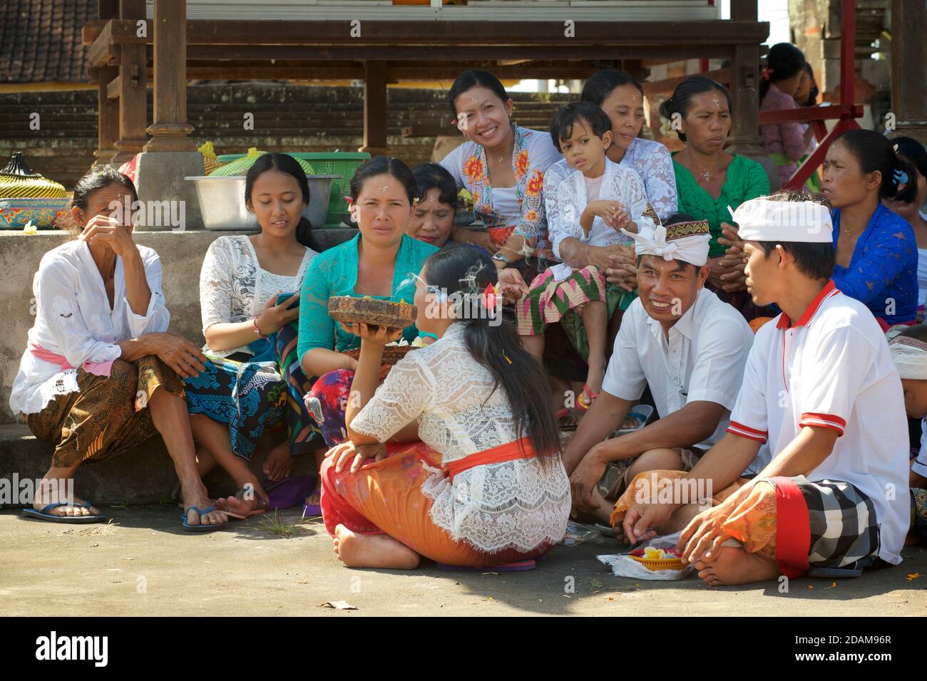 Balinese family at a local temple for the start of the Galungan ...