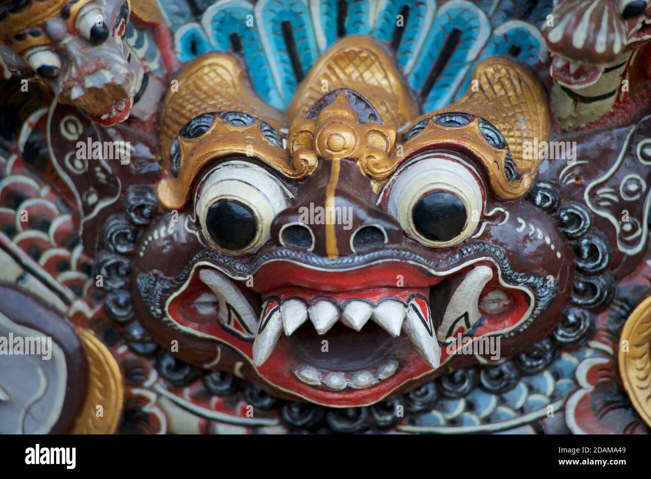 Wooden carving depicting Bhoma. In Balinese mythology, Bhoma is the son ...