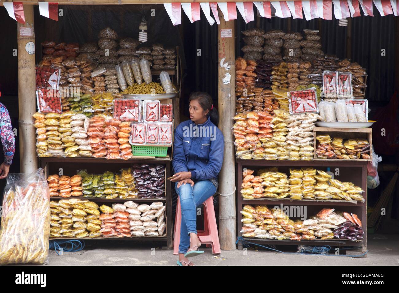 Balinese vendor and her roadside stall, Bedugul market, Bali, Indonesia ...
