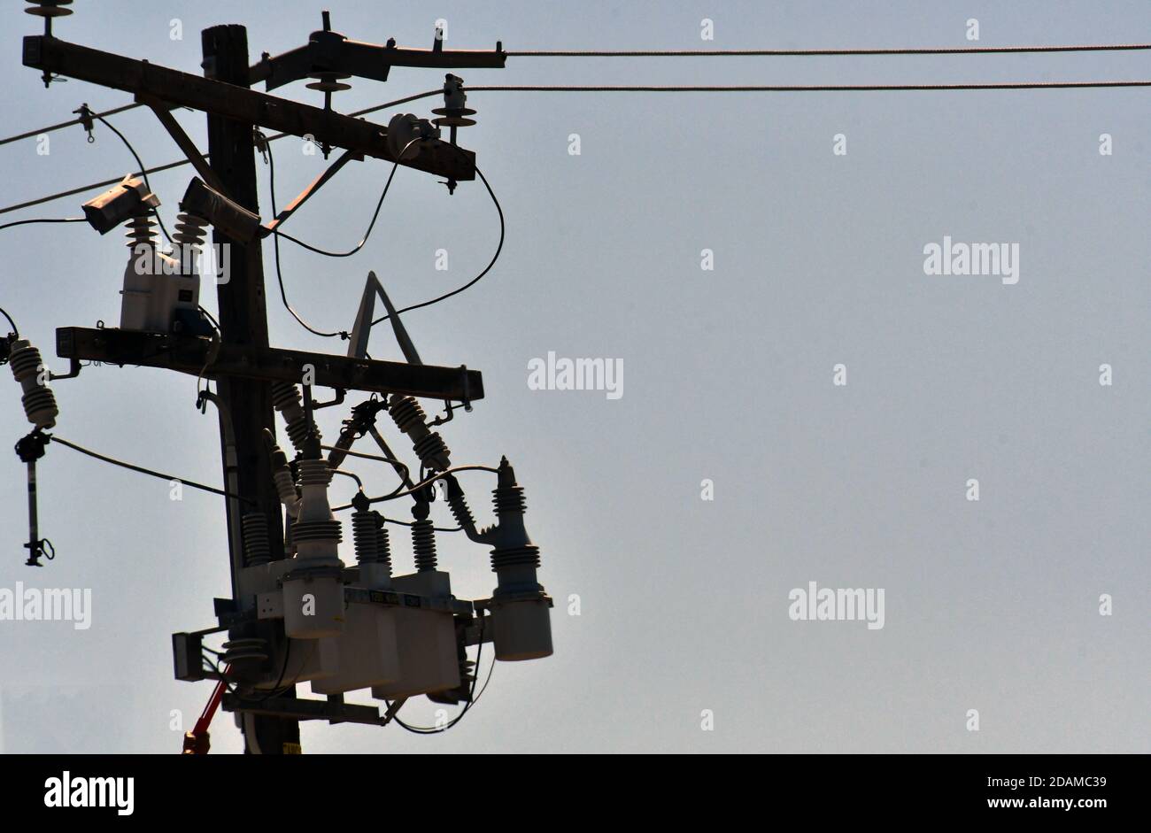 Low angle shot of an electrical power post under the sunlight at ...