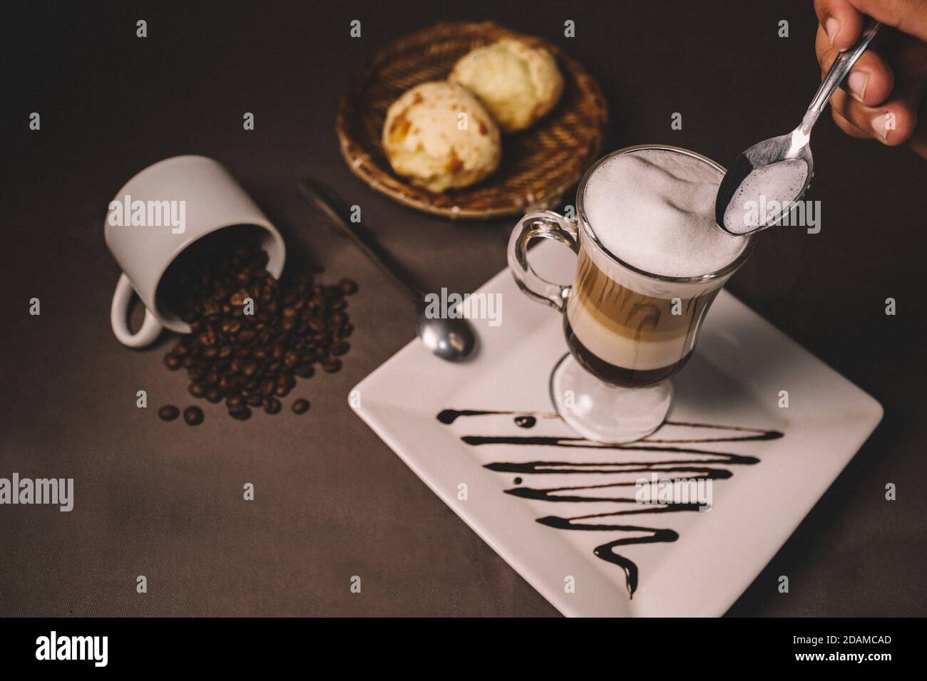 High angle shot of frothy milk being poured into a gourmet latte Stock ...