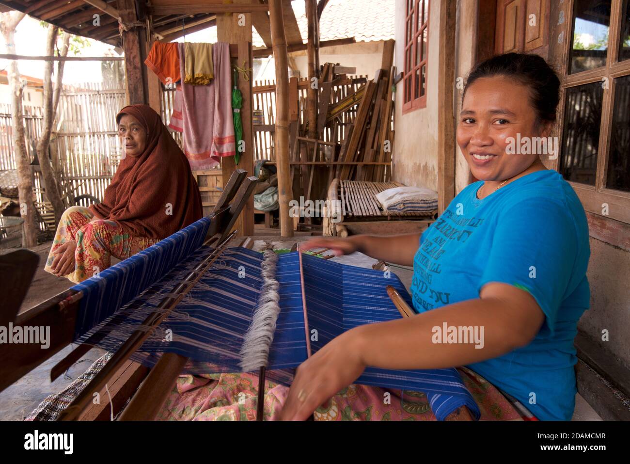 Pringgasela, Lombok, Indonesia Local weaver. Woman weaving on a ...