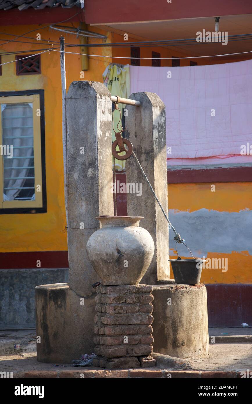 A standpipe and large pot in a village, Lombok, Indonesia. Still life ...
