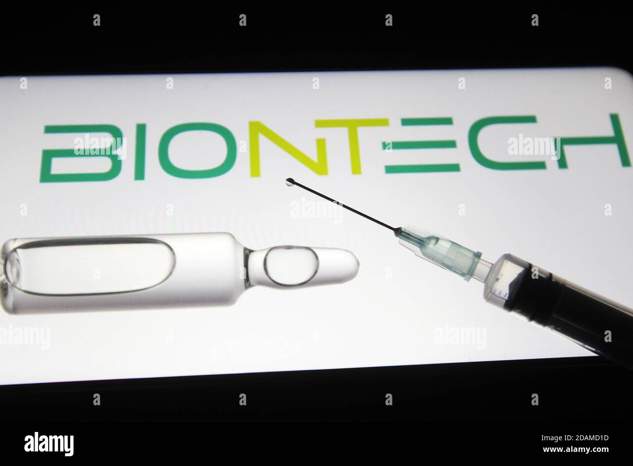 In this photo illustration a syringe and an ampule seen in front of the ...