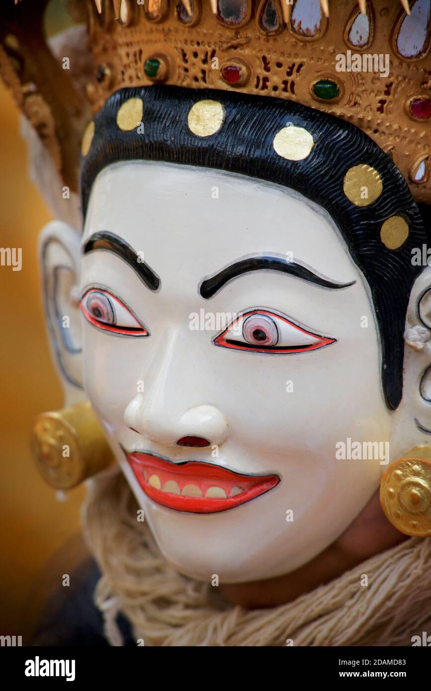 Young Balinese woman in festive dance wear for temple ceremonial dance ...