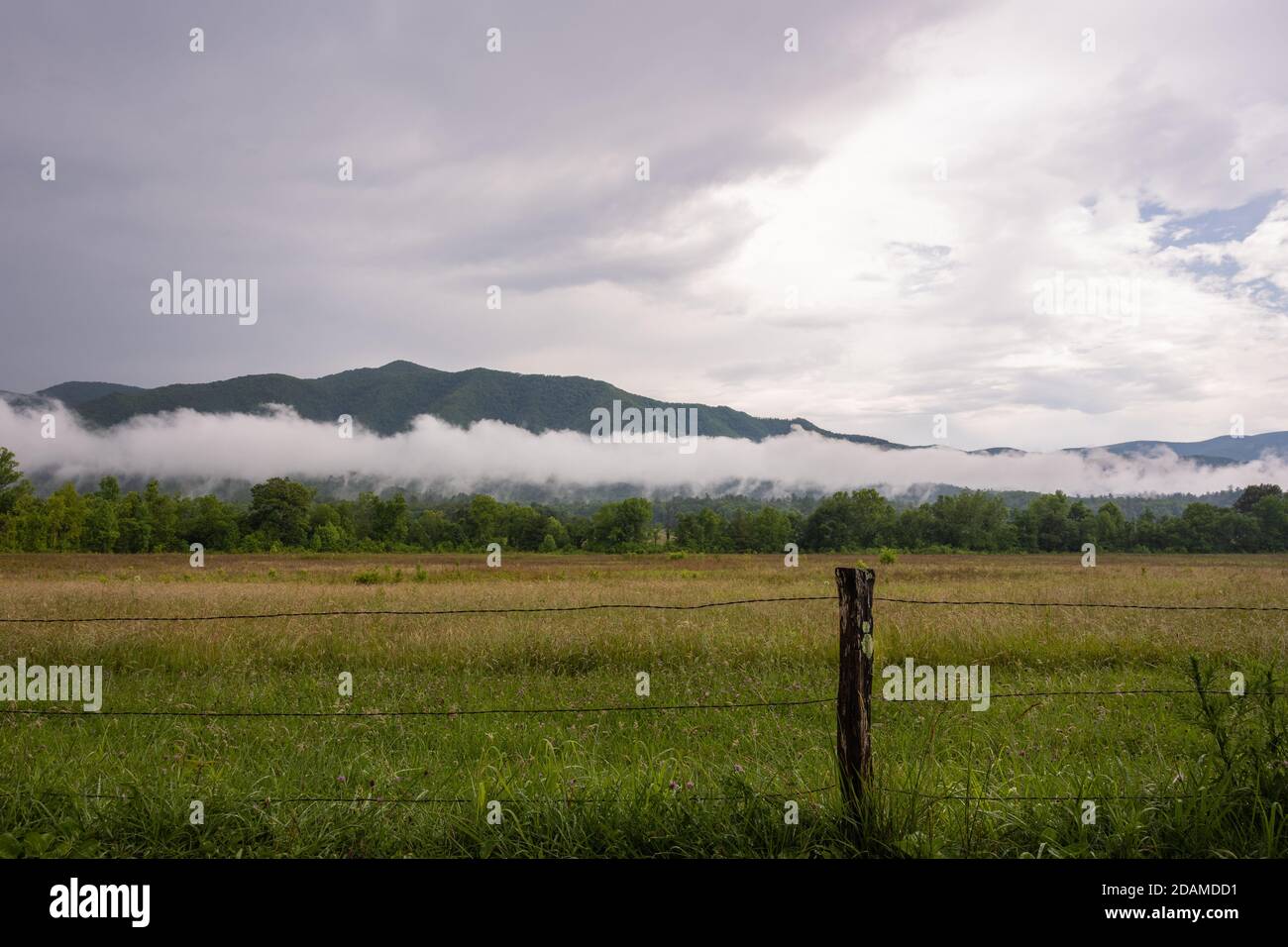 Old Fence and Low Clouds in Cades Cove valley Stock Photo - Alamy