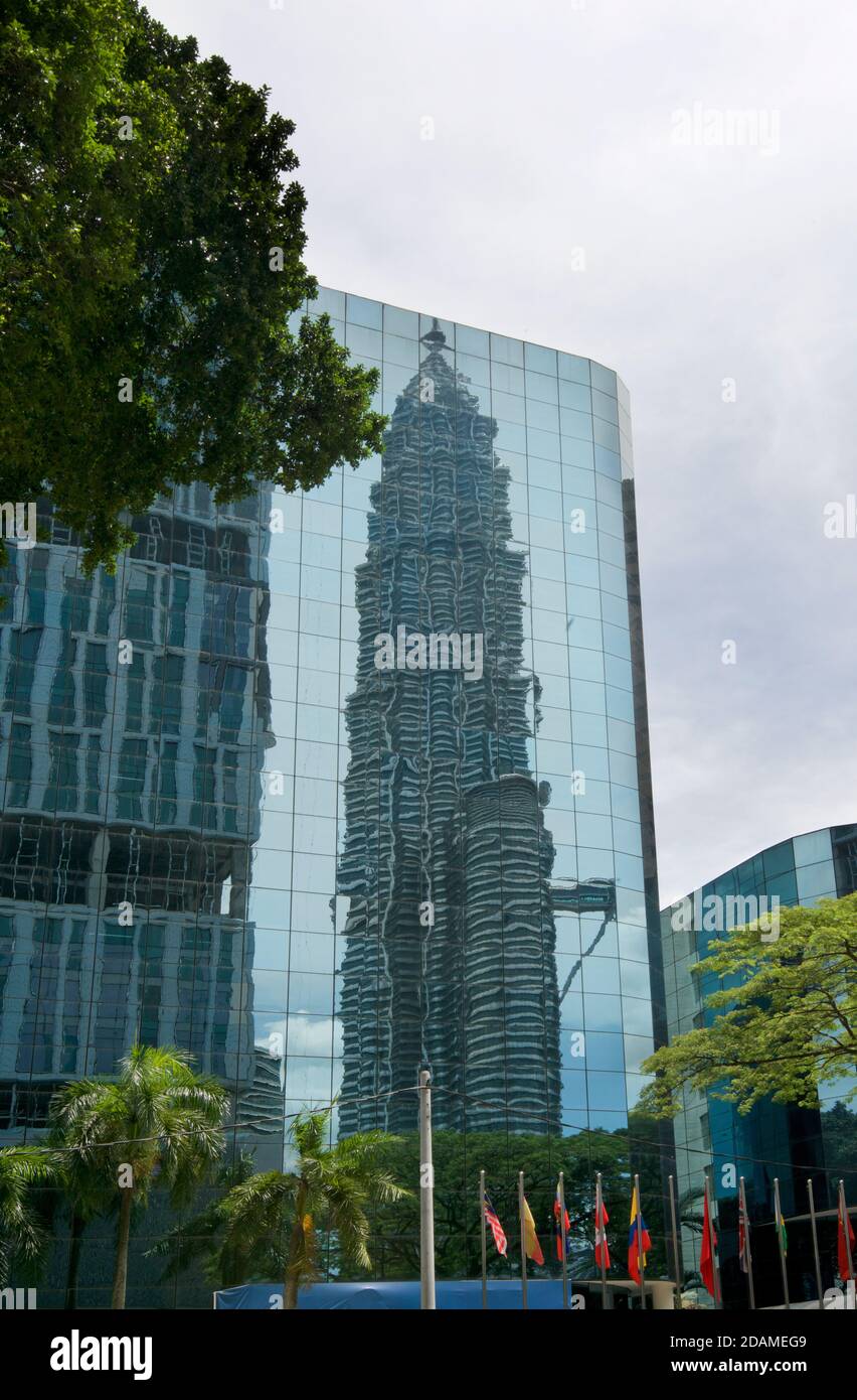 Reflection of the Petronas Twin Towers in a neighbouring building ...