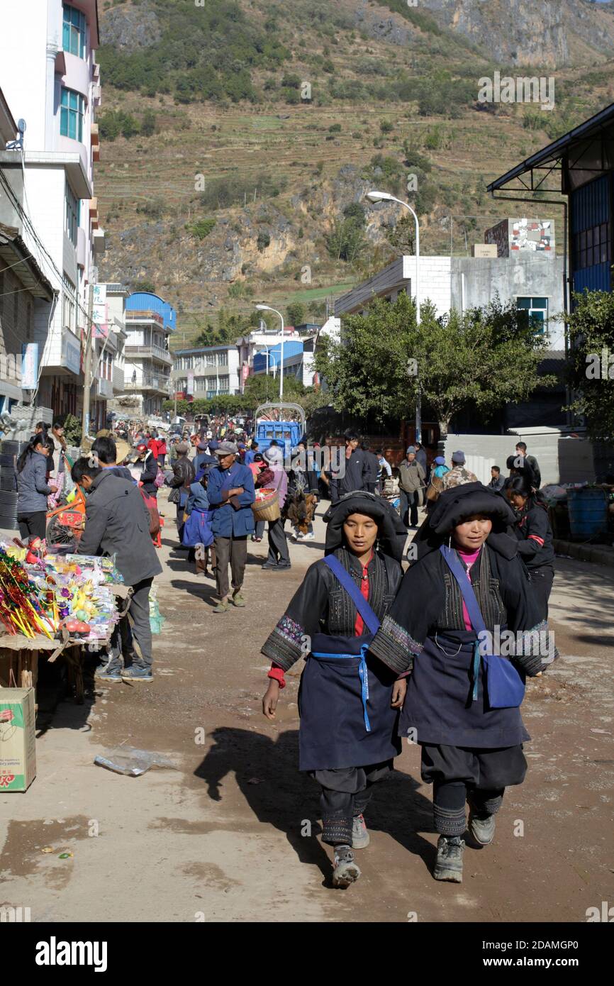 Two women in Yi minority costume, Market day at Wumulong, Lincang ...