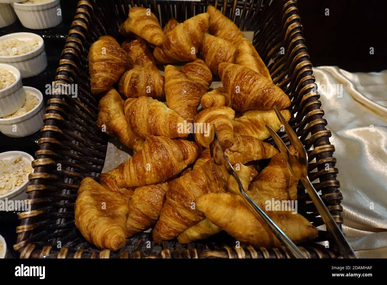 Buffet with croissants in basket in restaurant Stock Photo - Alamy
