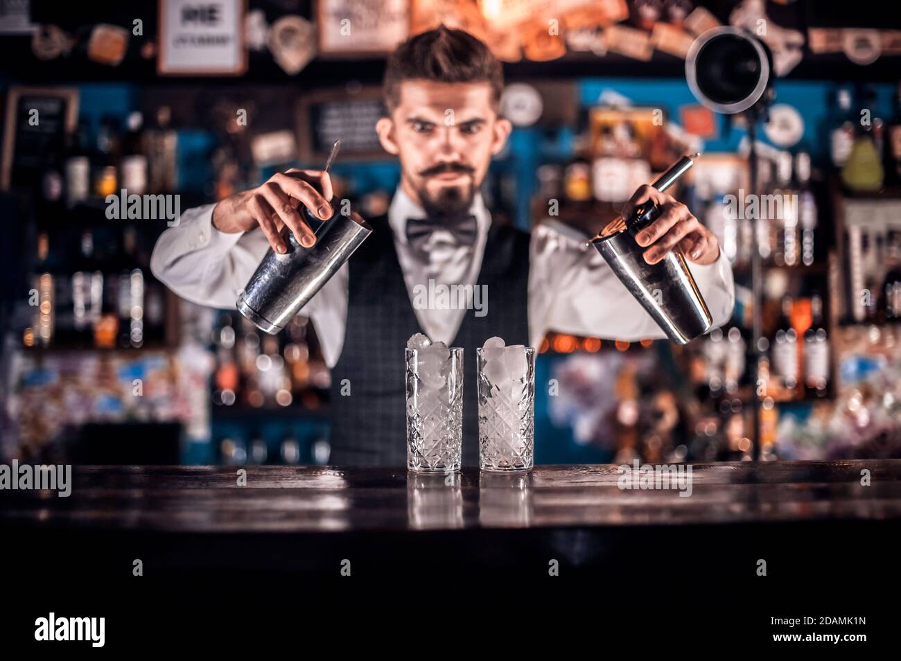 Professional bartending makes a cocktail Stock Photo - Alamy