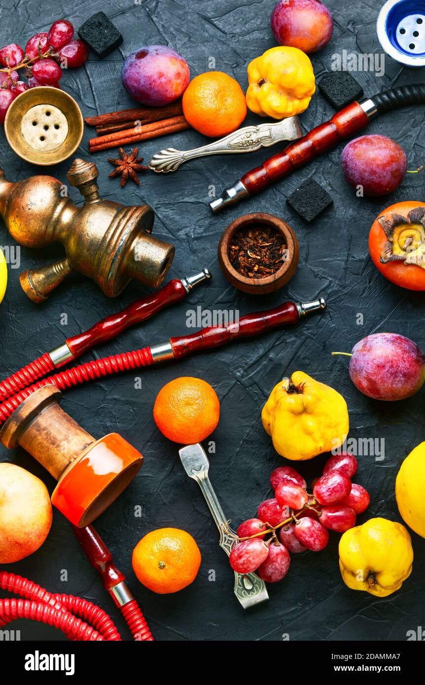 Smoking hookah with fresh fruit aroma.Tobacco fruit shisha Stock Photo ...