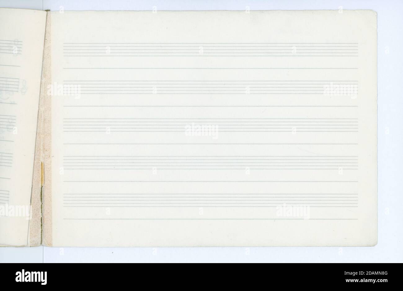 music paper preprinted with staffs for musical notation Stock Photo - Alamy