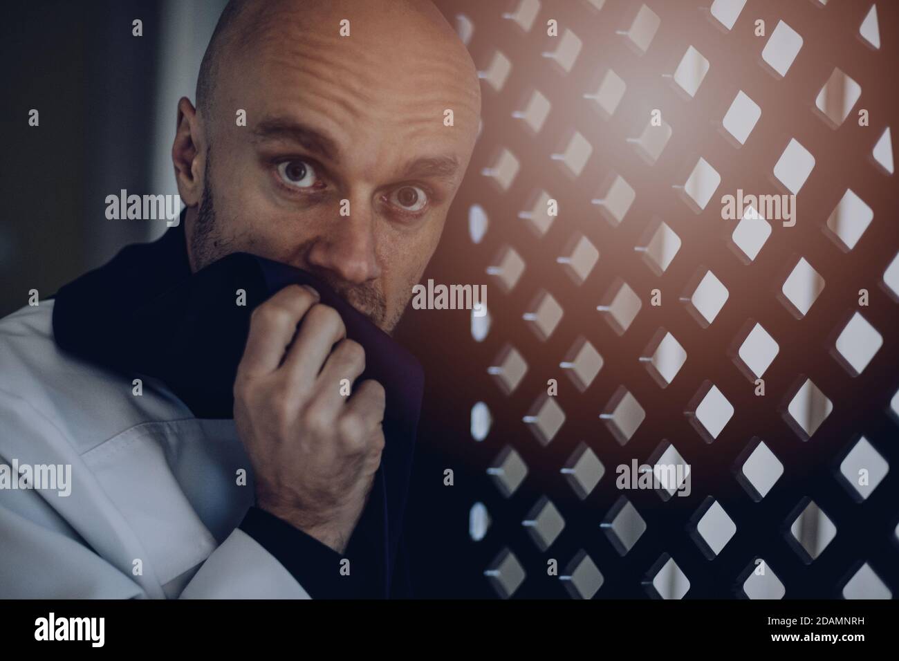 Priest vicar in confession booth Stock Photo - Alamy