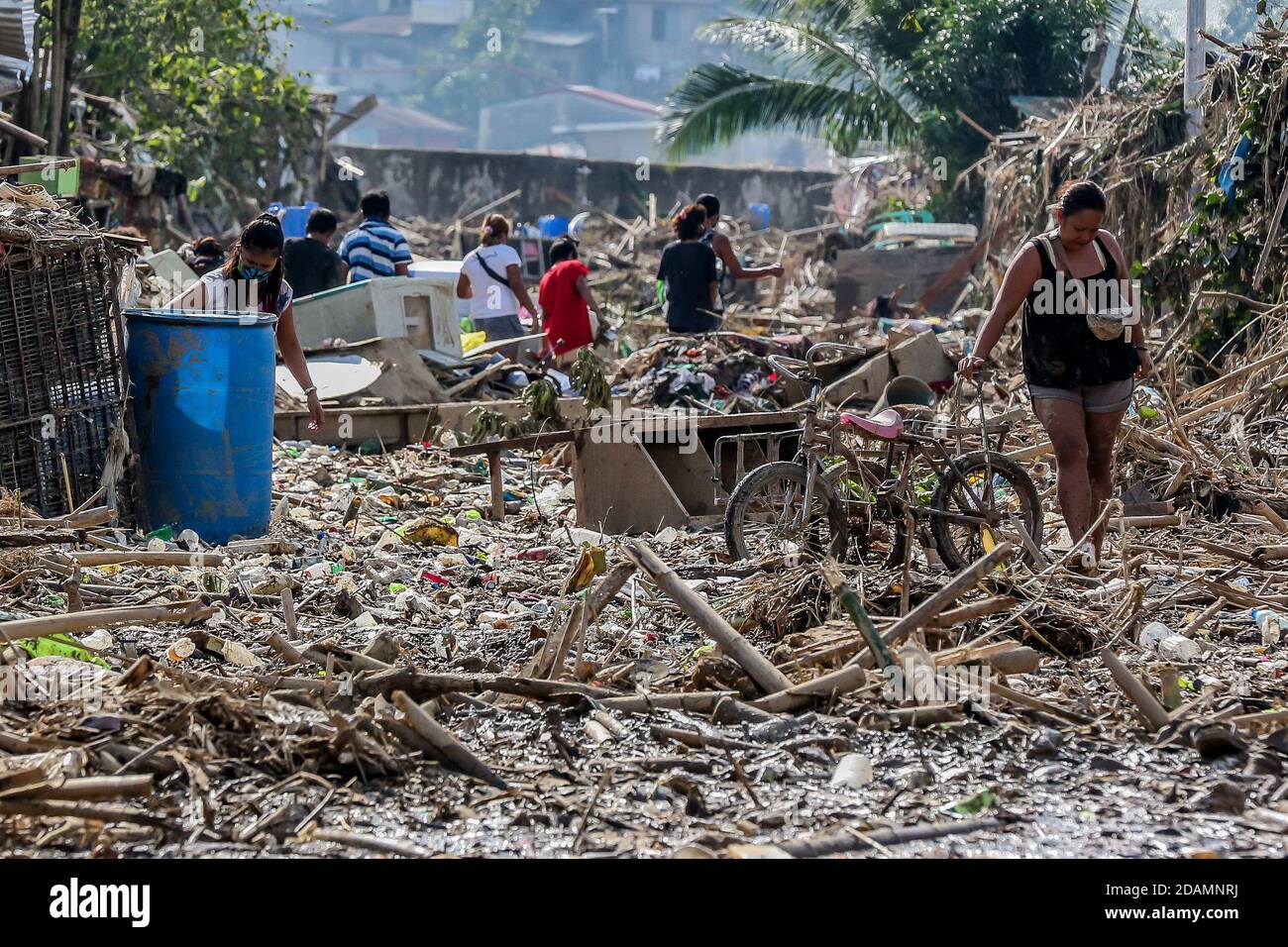 Rizal Province, Philippines. 14th Nov, 2020. Residents retrieve their ...
