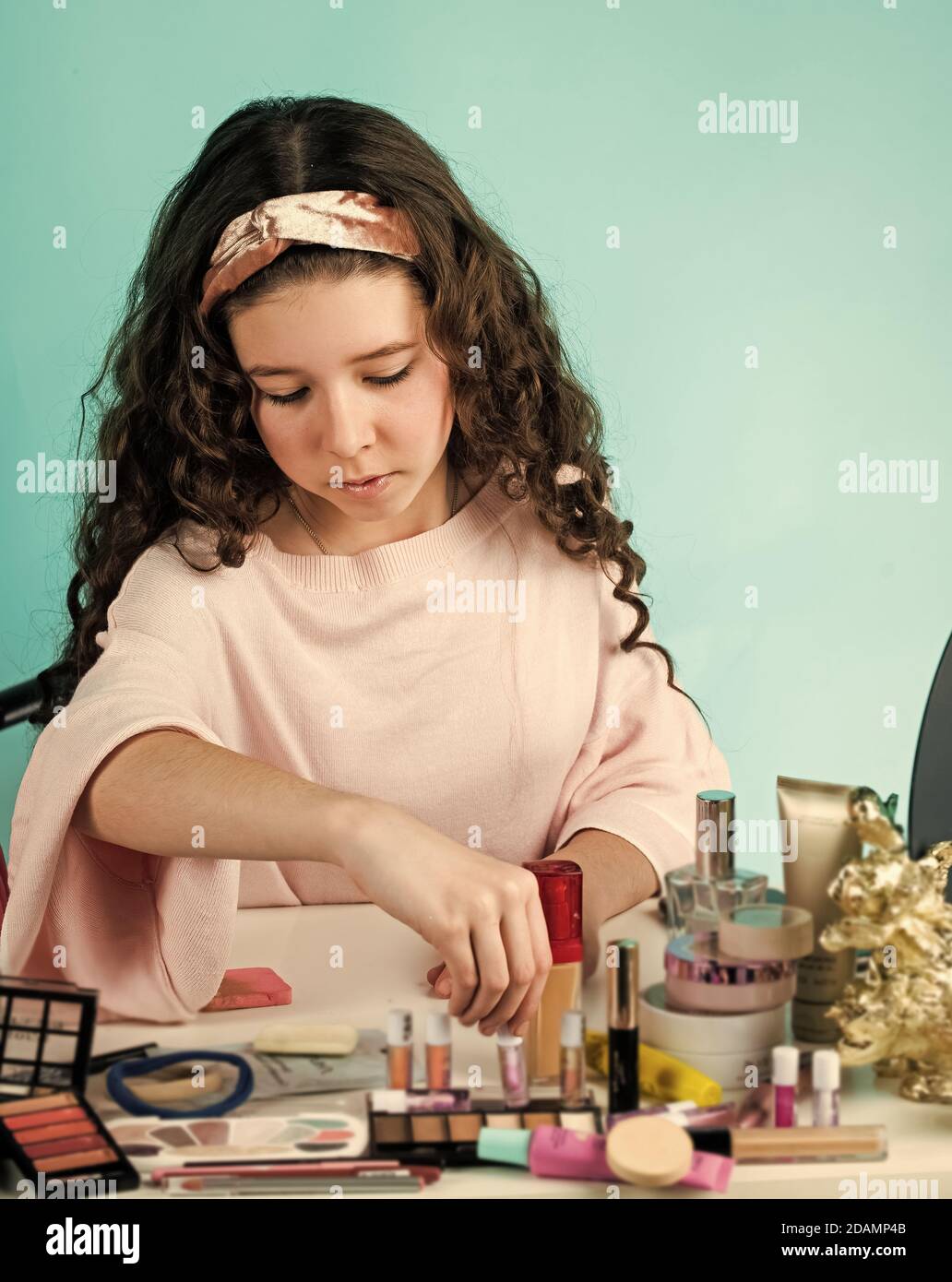 little girl with happy face. smiling girl have fun on spa beauty salon ...