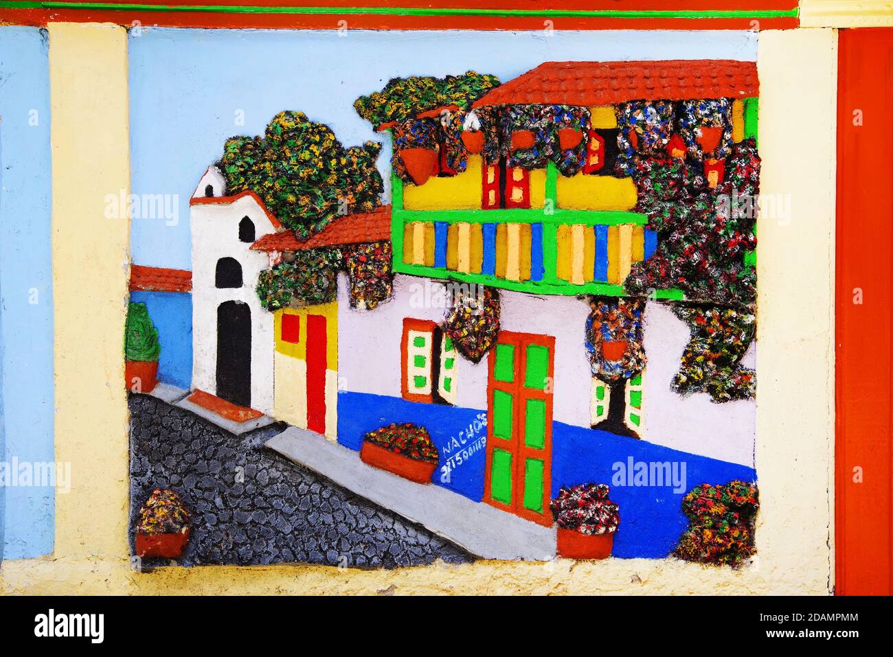 Colorful streets of Guatape city in Colombia, South America Stock Photo ...