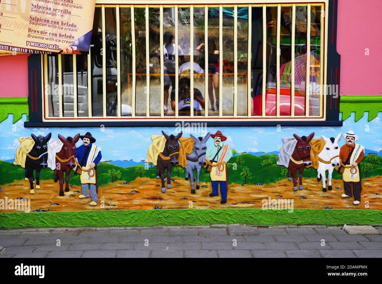 Colorful streets of Guatape city in Colombia, South America Stock Photo ...