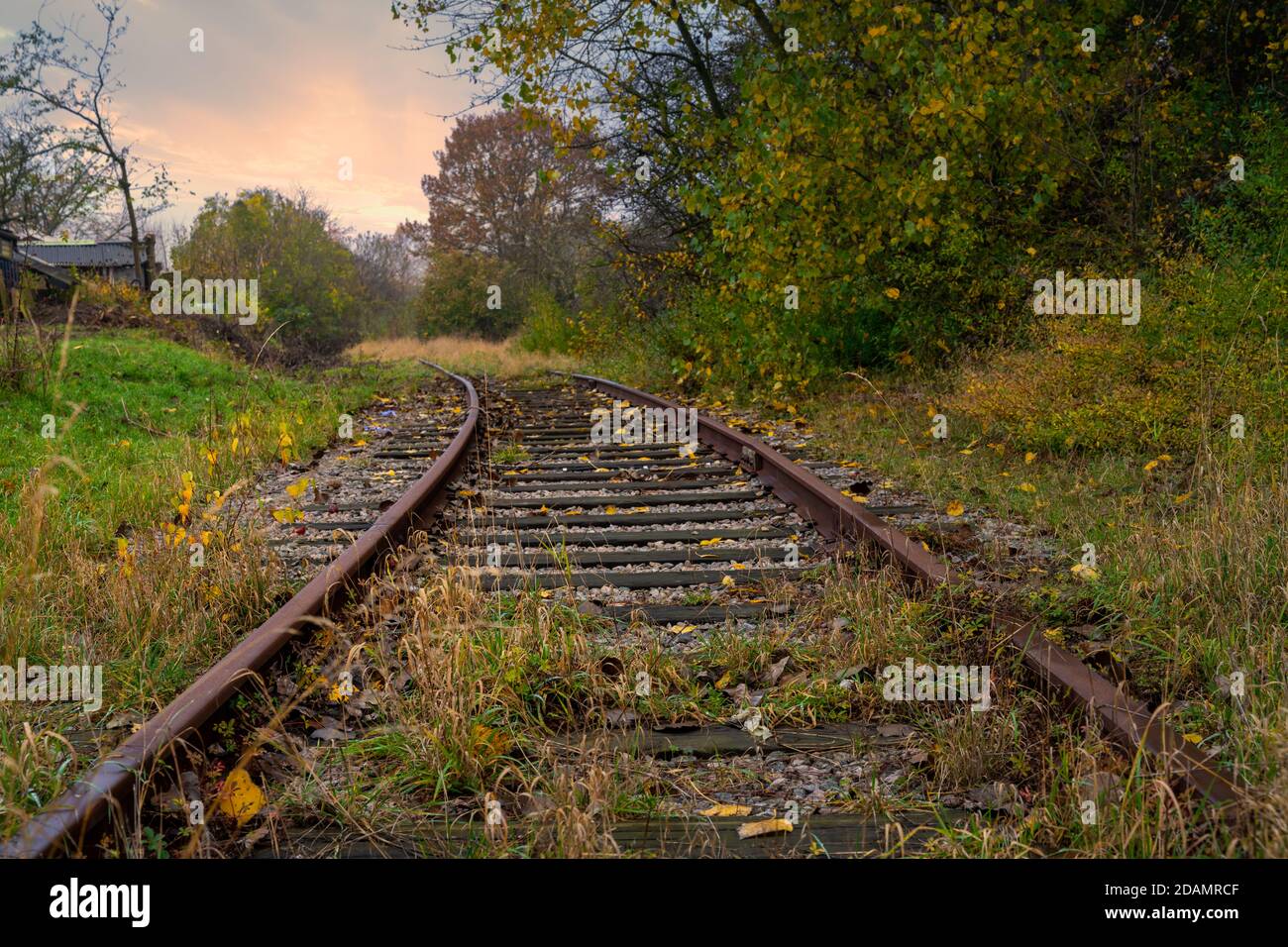 Railroad tracks with a dramatic sunset in the background. Picture from ...