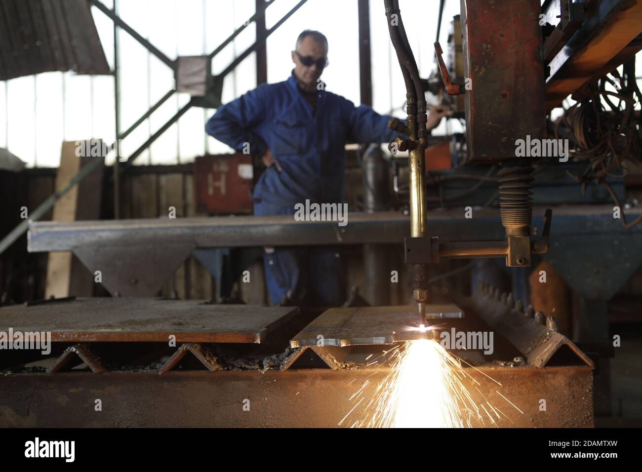 Factory workers in Bosnian factory Stock Photo - Alamy