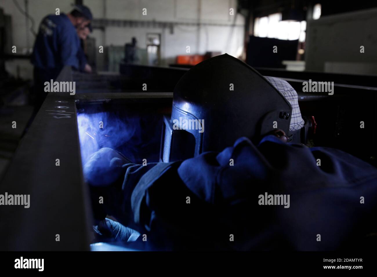 Factory workers in Bosnian factory Stock Photo - Alamy