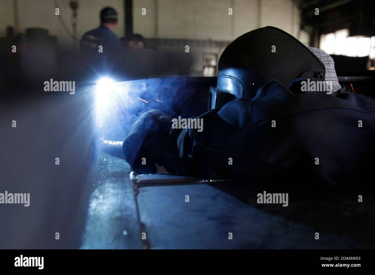 Factory workers in Bosnian factory Stock Photo - Alamy