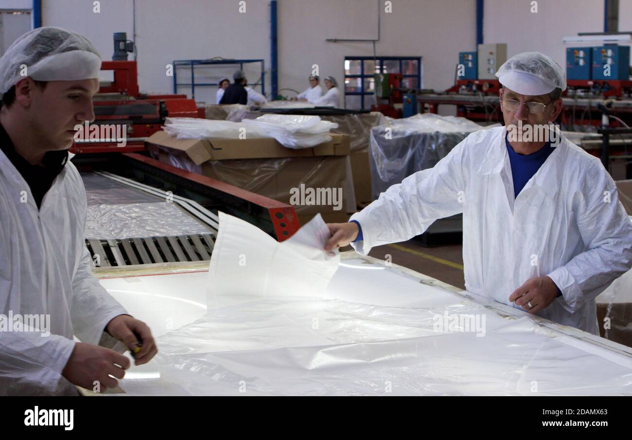 workers in factory Stock Photo - Alamy