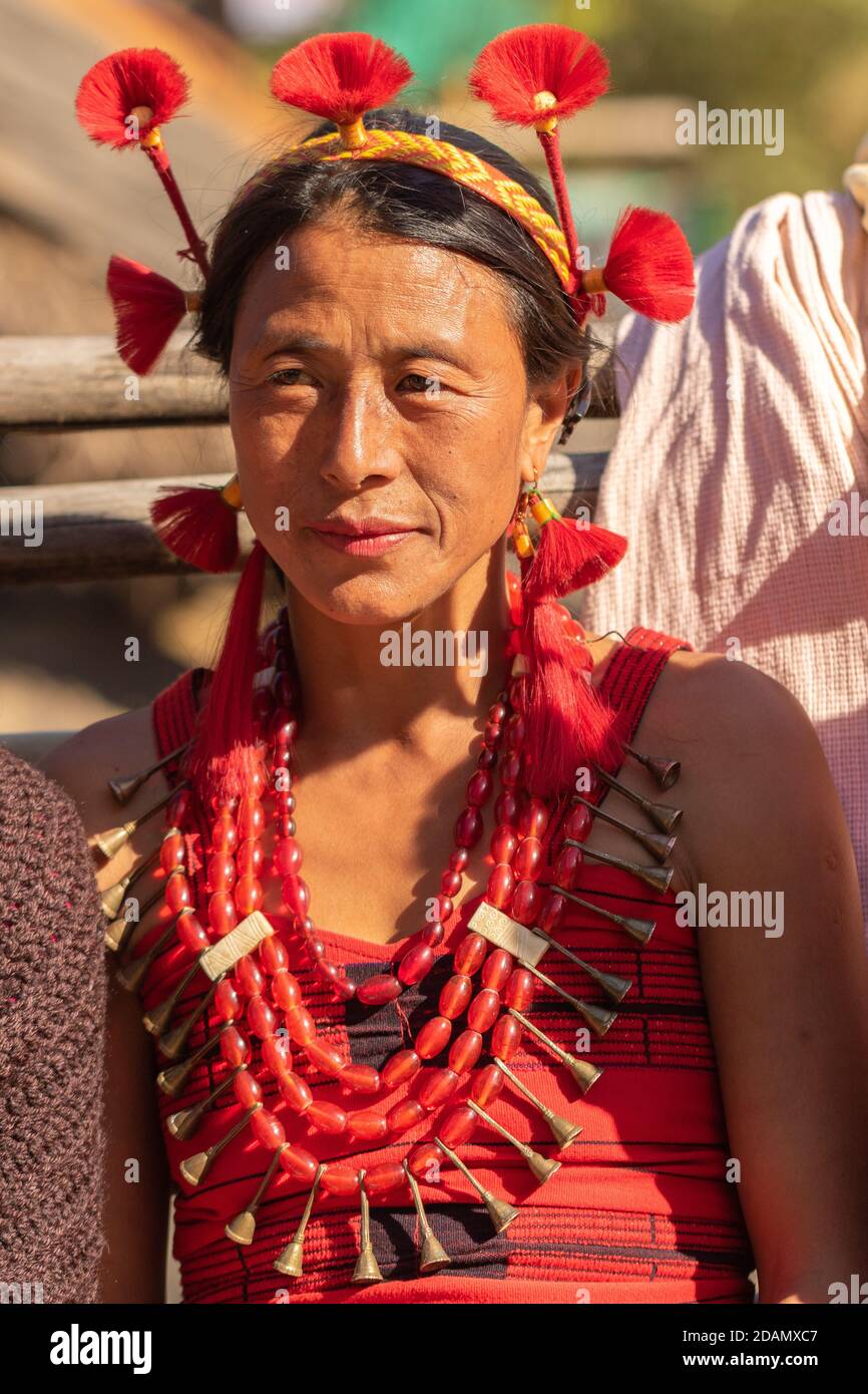 Portrait of a tribal Naga women dressed in traditional tribal attire at ...