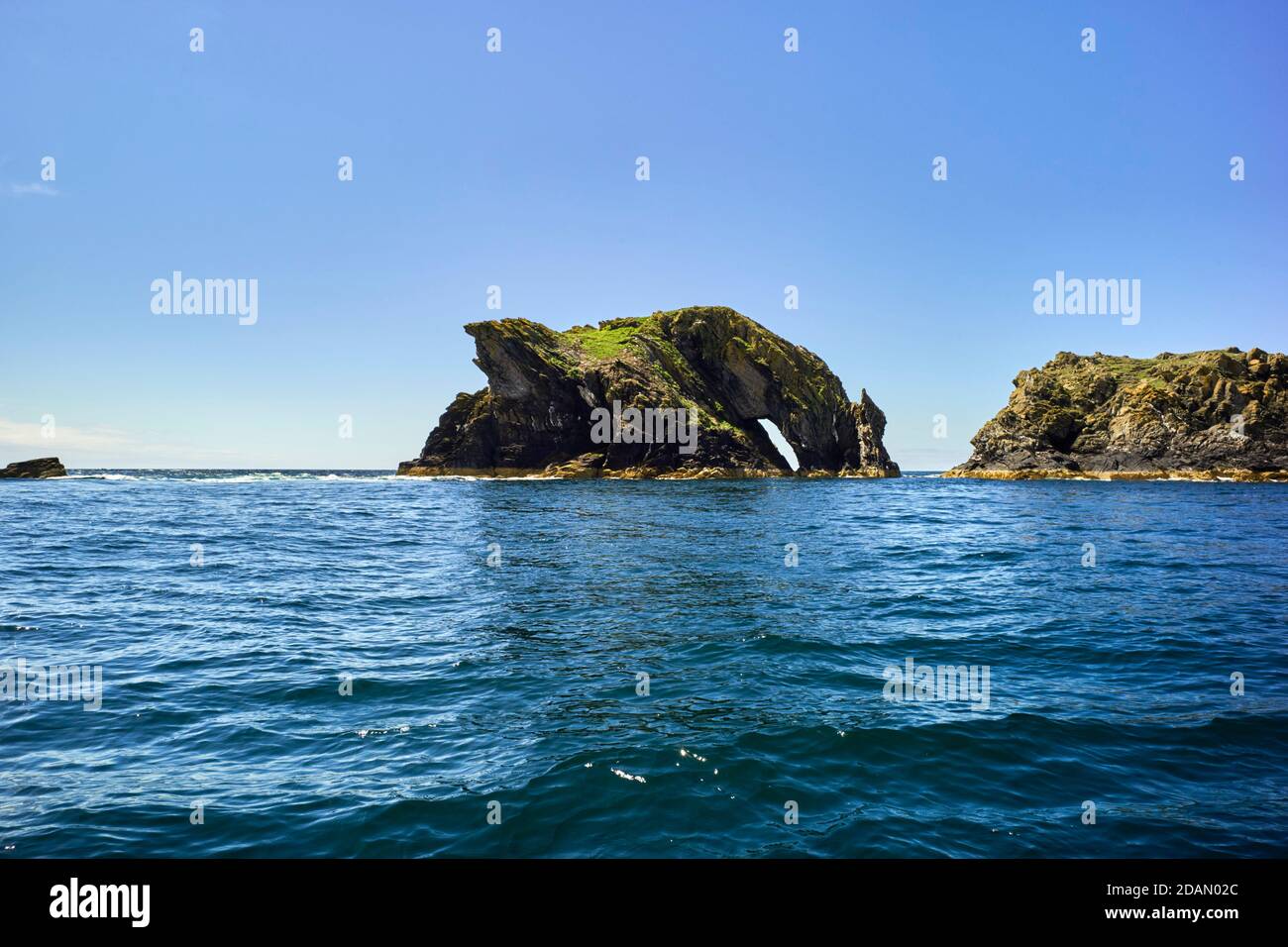 The drinking dragon rock at the Calf of Man off the coast at the Isle ...