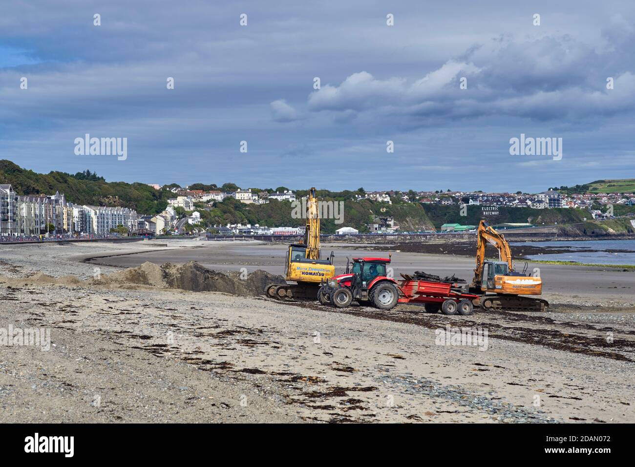 Groynes being removed on Douglas beach Stock Photo - Alamy