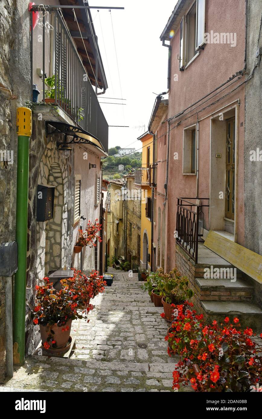 A narrow street among the old houses of Mirabello Sannitico, a medieval ...