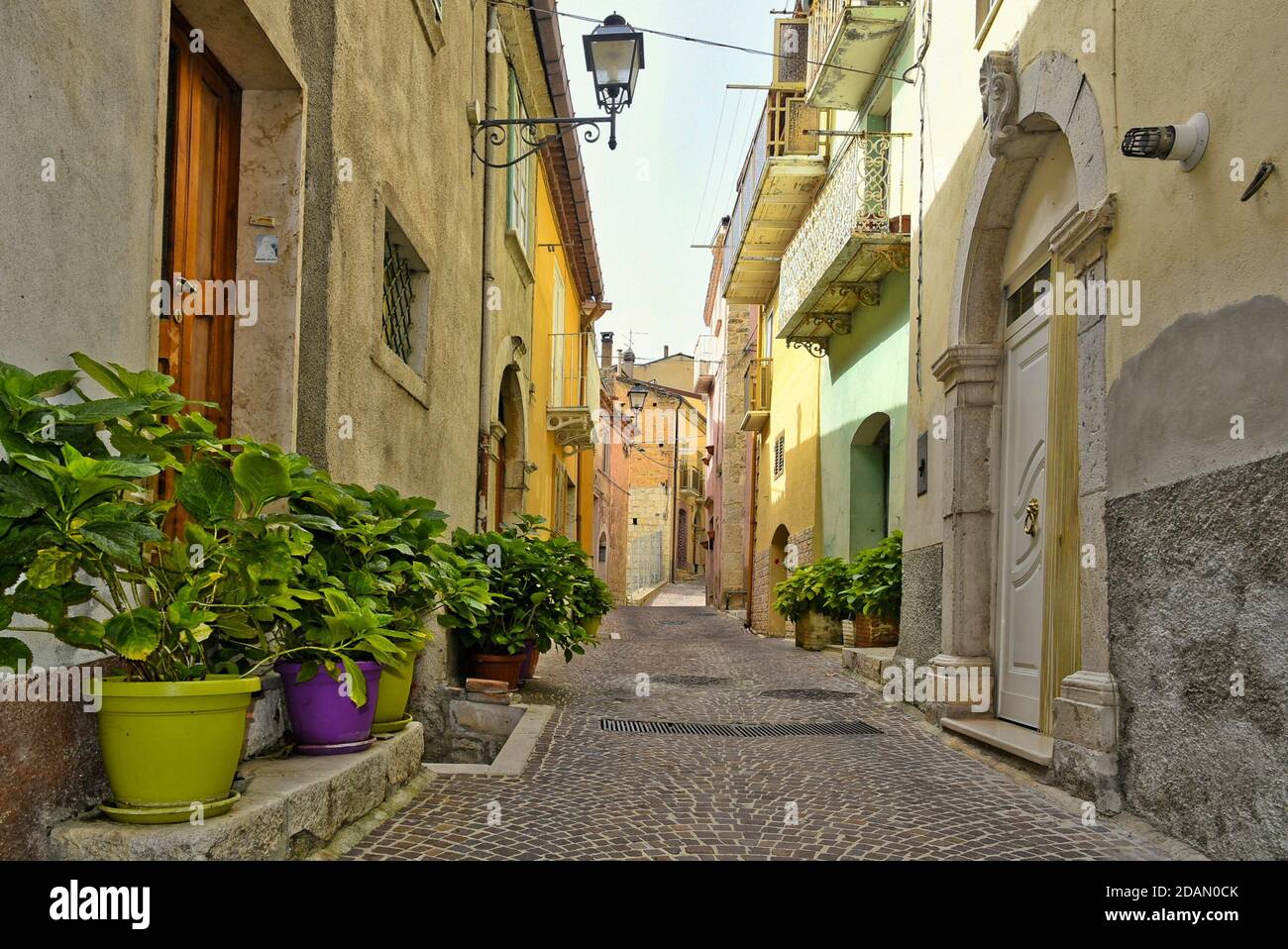 A narrow street among the old houses of Mirabello Sannitico, a medieval ...