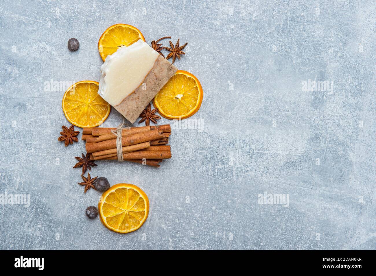 Handmade soap with cinamon and orange. Body and skin care. Flat lay ...