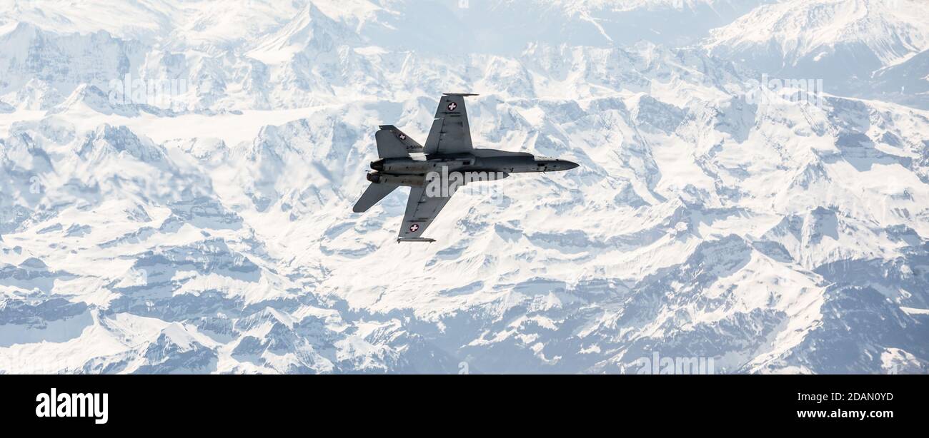 ALPS, SWITZERLAND - Apr 21, 2015: F-18 fighter jet of Swiss military ...